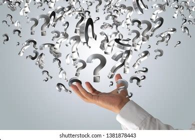 Business Man Holding Question Marks Stock Photo 1381878443 Shutterstock