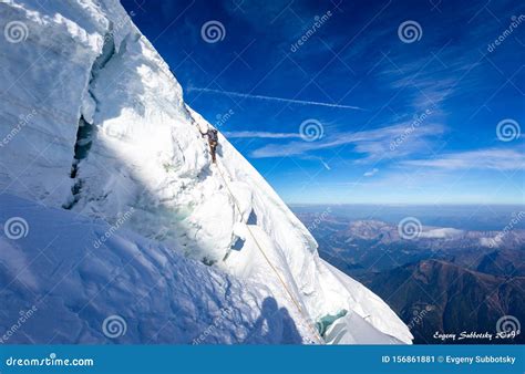 Alpinist Mountaineer Climbing Snow Ice Mountain Slope Royalty Free