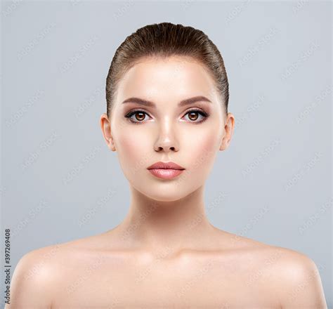 Front Portrait Of A White Young Woman With Beauty Face Isolated Skin Care Concept 素材庫相片