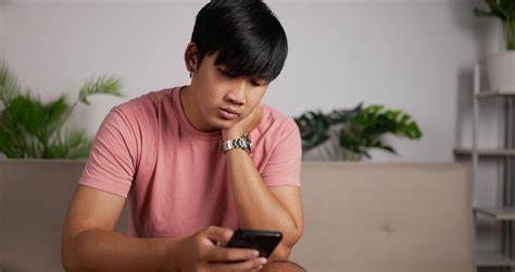 Person Scrolling On Phone Stock Video Footage For Free Download