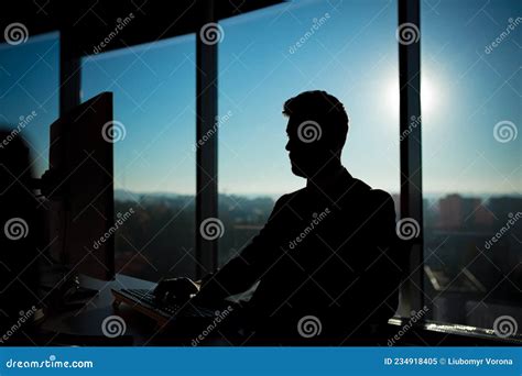 Successful Businessman Boss Working At Computer On The Background Of