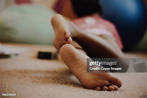 Barefoot Lying On Front Photos And Premium High Res Pictures Getty Images