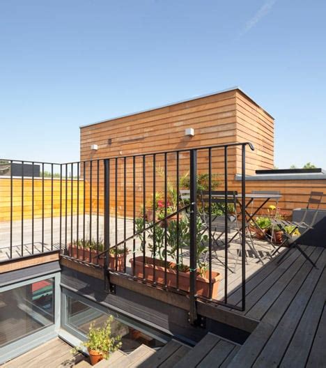 scenario lowers a ceiling to create a sunken roof terrace