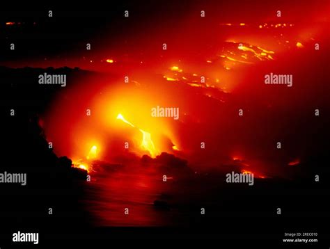 Kilauea Lava Flowing Into The Ocean At Hawaii Volcanoes National Park