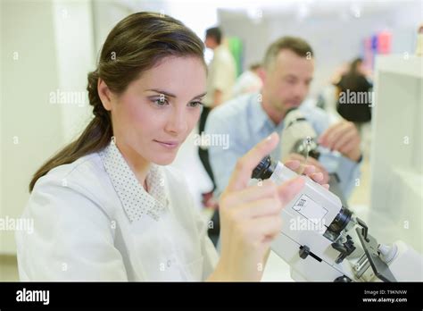 Microscope And Woman Stock Photo Alamy