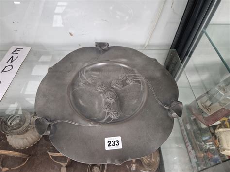 An Art Nouveau Pewter Dish Central Worked With Raspberry Like