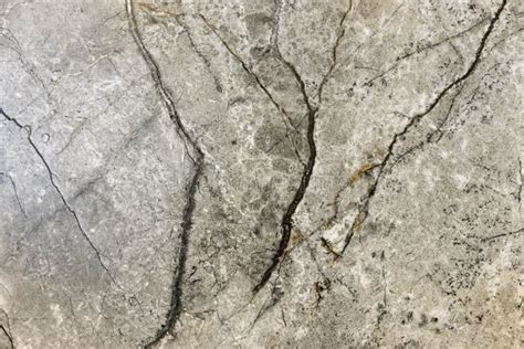 Stone Rust Texture Or Background With Corrosion Spots And Deep Crack Stone Rust Texture Or Background With Corrosion Spots And Deep Crack