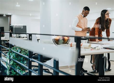 Multiracial Corporate Team Collaborating In A Creative Office