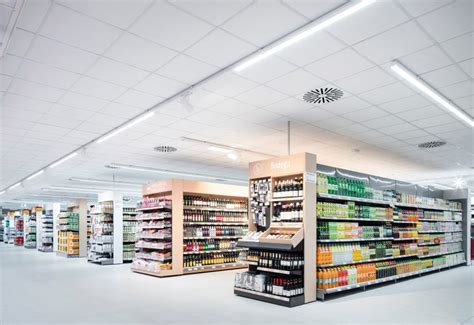 culdesac designs coherent interiors for consum supermarket in benicàssim