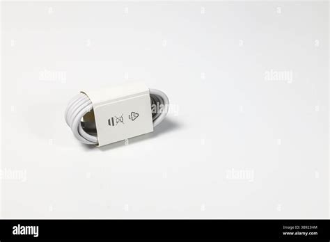 New White Usb Type Charger Cable In Paper Pack Compatible For Many Devices Wrapped In A Spiral