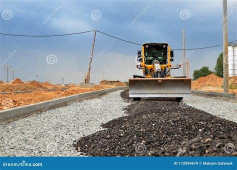 Motor Grader On Road Construction Orange Bulldozer On Bridge Road
