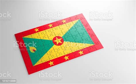 그레나다의 국기가 인쇄된 직소 퍼즐 흰색 배경에 고립 된 퍼즐 조각 성취와 완벽한 개념 국가 무결성의 상징 3d 일러스트레이션