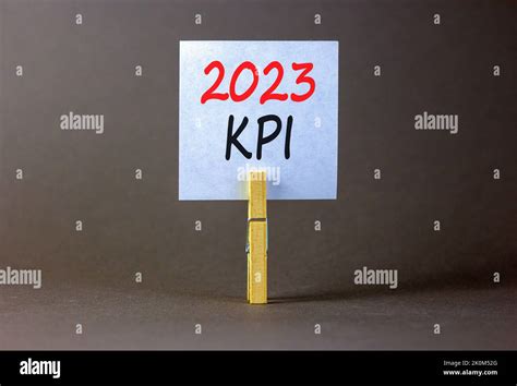 KPI Key Performance Indicator Symbol White Paper With Words KPI Clip On Wooden