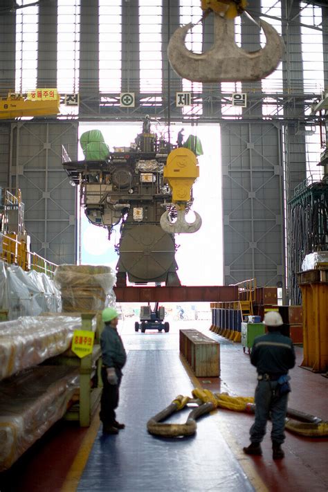 Man Two Stroke Engine In The Production … License Image 70408224 Image Professionals