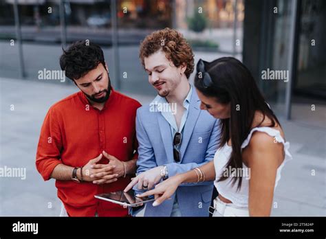 Corporate Architects Discussing Project Costs And Sustainable Design In