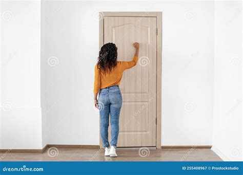 Black Lady Knocking At Entry Door Of Apartment Back View Stock Image Image Of House
