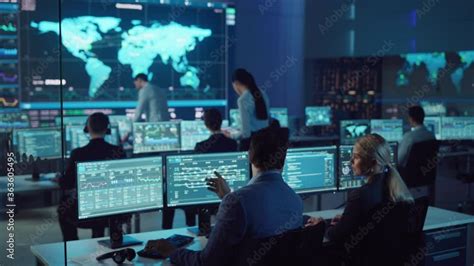 Team Of Professional Computer Data Science Engineers Work On Desktops