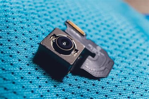 Premium Photo Closeup Of Camera Sensor Chip On Cloth Background