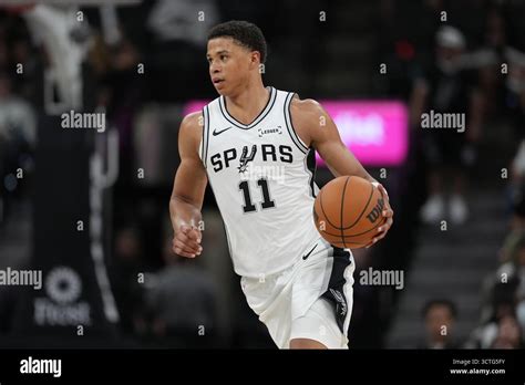 San Antonio Spurs Forward Carter Bryant 11 Takes The Ball Up Court