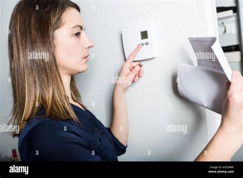 Energy Thermostat Woman Bill Hi Res Stock Photography And Images Alamy