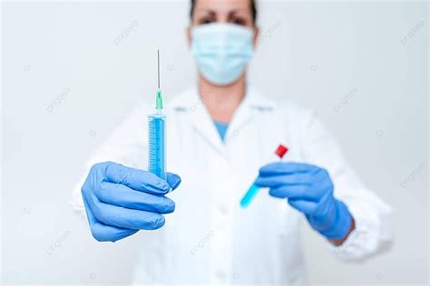 Lab Experiment With New Medical Vaccine Formulation And Protective Gear Photo Background And