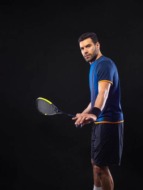 Premium Photo Squash Player On A Squash Court With Racket Man Athlete