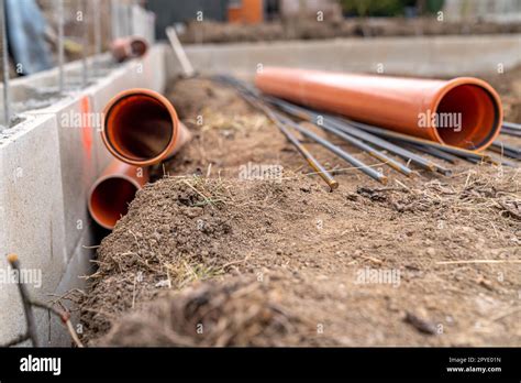 Plastic Pipe For Sewage Network In The Base Plate At The Construction