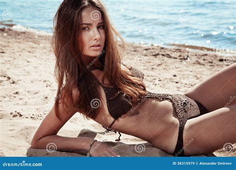 Beautiful Young Brunette Woman On A Sunny Beach Stock Image Image Of