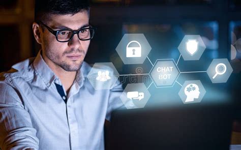 Young Man Wearing Eyeglasses Working On Laptop Using Artificial Intelligence Stock Image