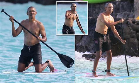 Shirtless Barack Obama Is Pictured Paddleboarding In Hawaii Daily Mail Online