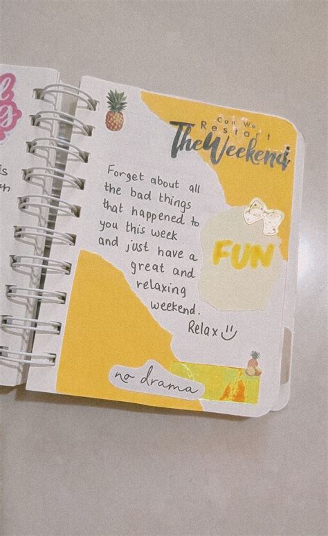 An Open Notebook With Writing On It And A Pineapple Next To The Page