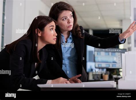 Architects Working On Building Architecture Draft Discussing 3d Model Brainstorming On Meeting