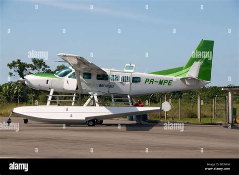 A 16 Passenger Float Plane Unloads At The Barcelos Brazil Airport Just