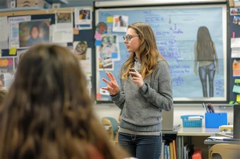 Premium Photo A Woman Standing In Front Of A Class Room