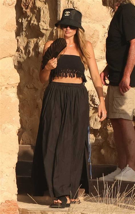 Margot Robbie In A Black Dress Was Seen Out With Cara Delevingne In