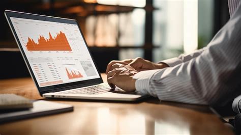 Premium Ai Image Closeup Of A Mans Hands Typing On A Laptop Keyboard With A Stack Of