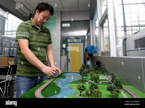 Deng Zigang An Associate Professor Of Southwest Jiaotong University Shows A Model Of A Super