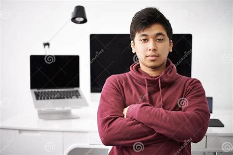 Laptop Portrait And Man On Software For Update In Office With Information Technology For