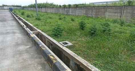 A View Of A Ditch And Garden Area With Grass Stock Image Image Of Infrastructure Canal 260801577