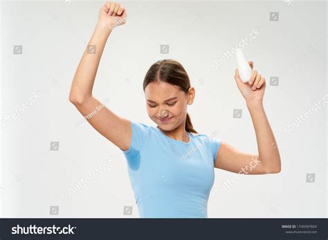 Стоковая фотография 1749397604 Girl Sweaty Armpit Deodorant Bad Smell