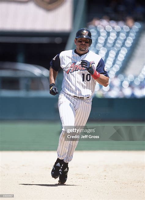 Shortstop Benji Gil Of The Anaheim Angels Runs Towards Third Base