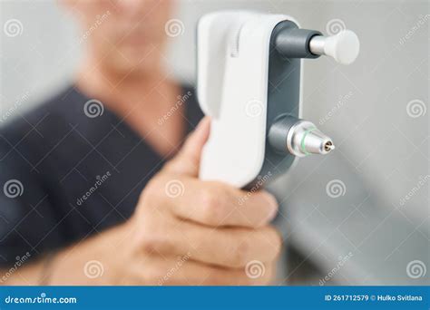 Close Up Photo Of Male Doctor Holding Tonometer Stock Image Image Of