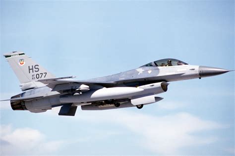 A Right Side View Of An F 16 Aircraft Taking Off During Long Rifle Iii