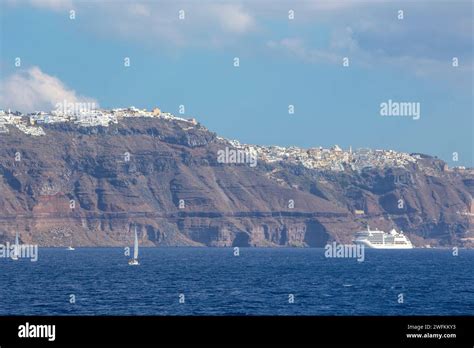 Santorini The Cliffs Of Calera With The Cruises Withe The Thera And Firostefani In The