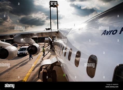 Passenger Embark Onto A Lufthansa Regional Airliner At Frankfurt