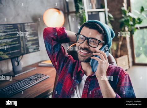 Photo Of Positive Cheerful Coder Dressed Hat Glasses Smiling Talking Apple Samsung Modern Gadget