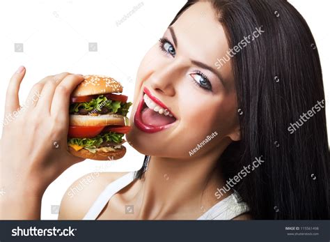 Happy Cute Woman Eating Hamburger On Stock Photo Shutterstock