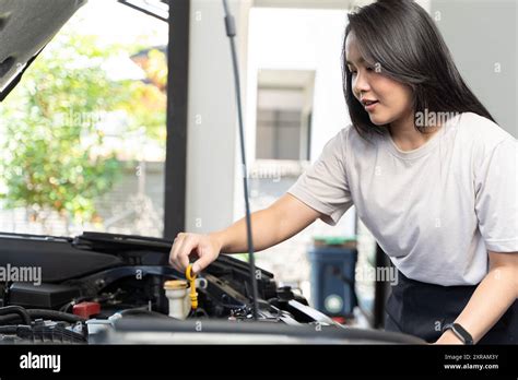 Asian Driver Woman Checking Car Radiator Problems Female Checks Break