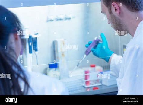 Science Babe Using Pipette In The Lab Stock Photo Alamy