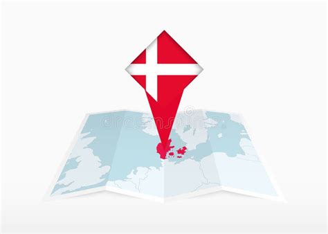 Denmark Is Depicted On A Folded Paper Map And Pinned Location Marker With Flag Of Denmark Stock